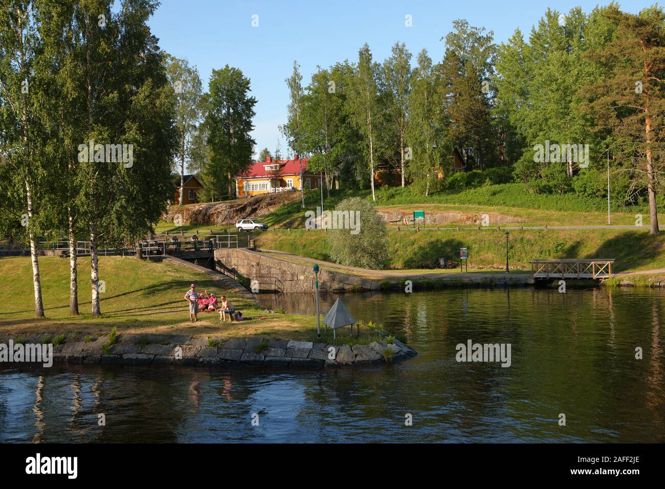 Lappeenranta, Finland - June 2, 2018: People resting on the bank of ...