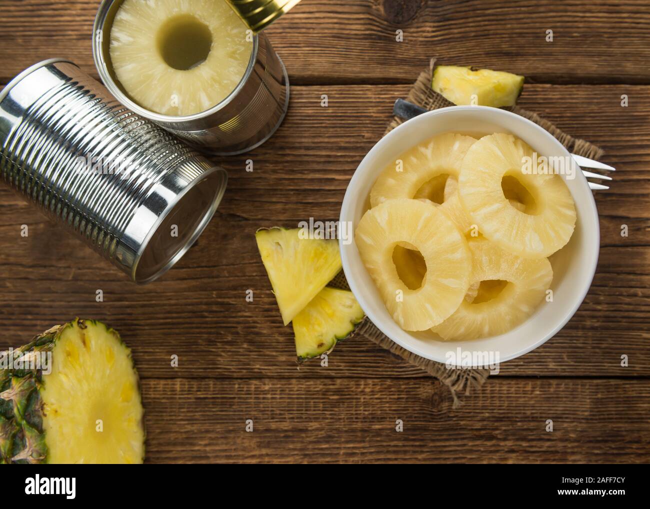 Fresh made Preserved Pineapple Rings on a vintage background as ...