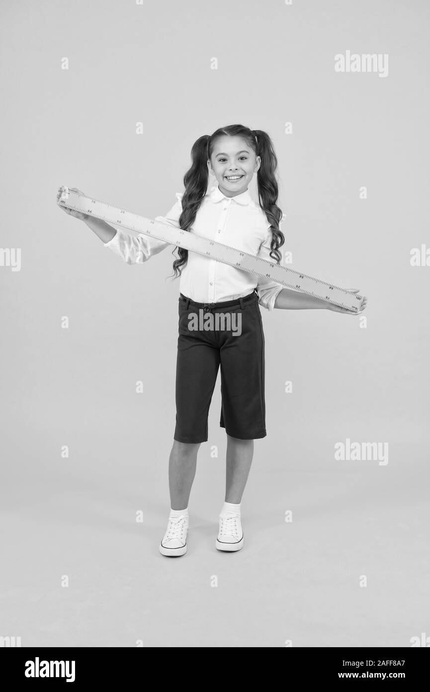 Girl measuring ruler school Black and White Stock Photos & Images - Alamy