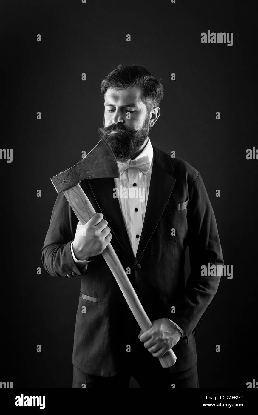 Brutal and bearded. Brutal groom hold axe. Hipster keep sharp axe blade ...