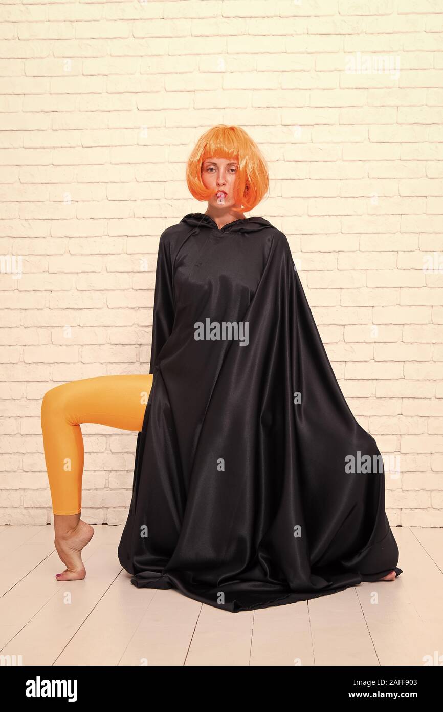 Woman ginger wig performing modern art dance. Dancer lifestyle ...