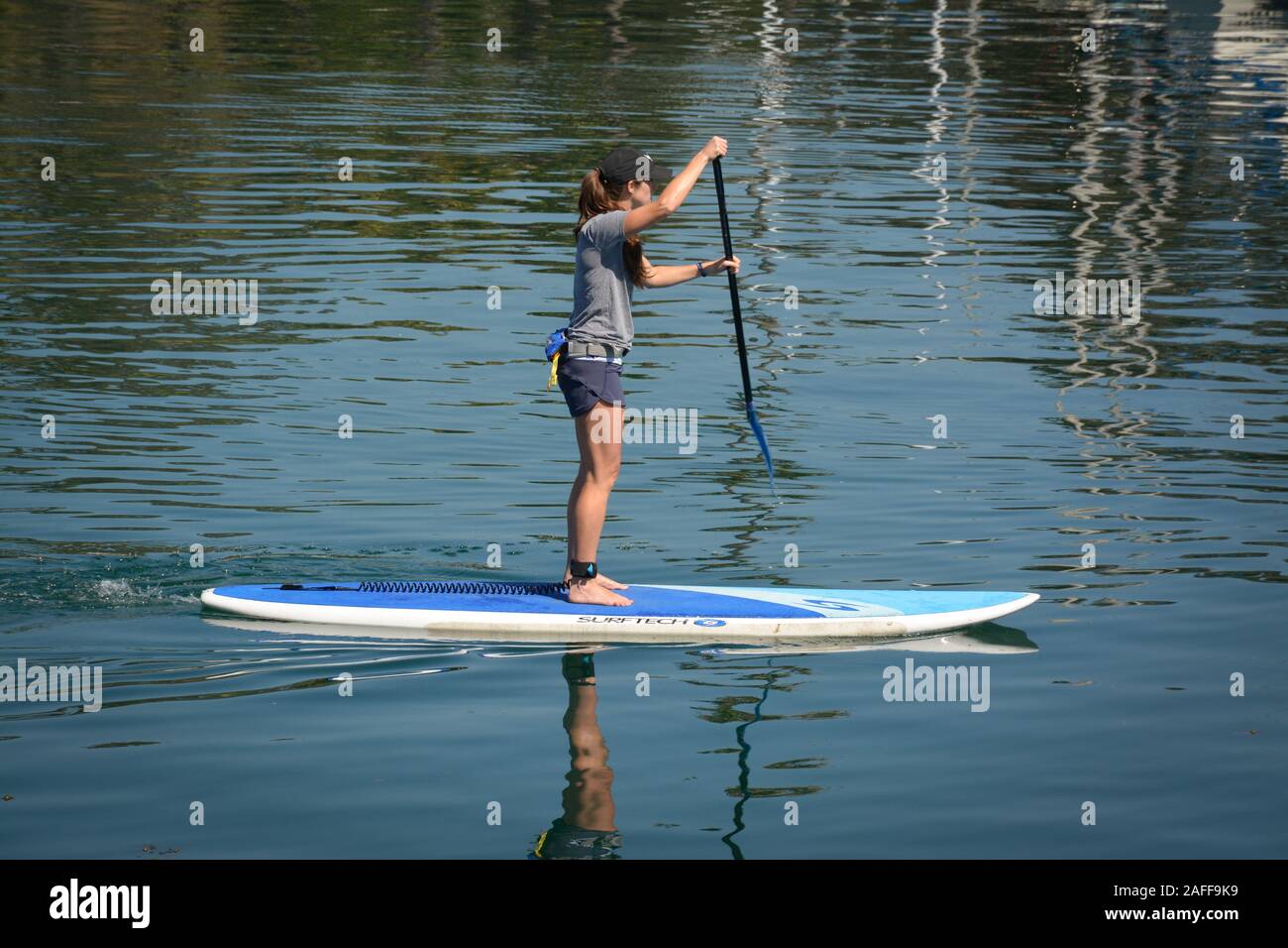 Woman paddling board hi-res stock photography and images - Alamy