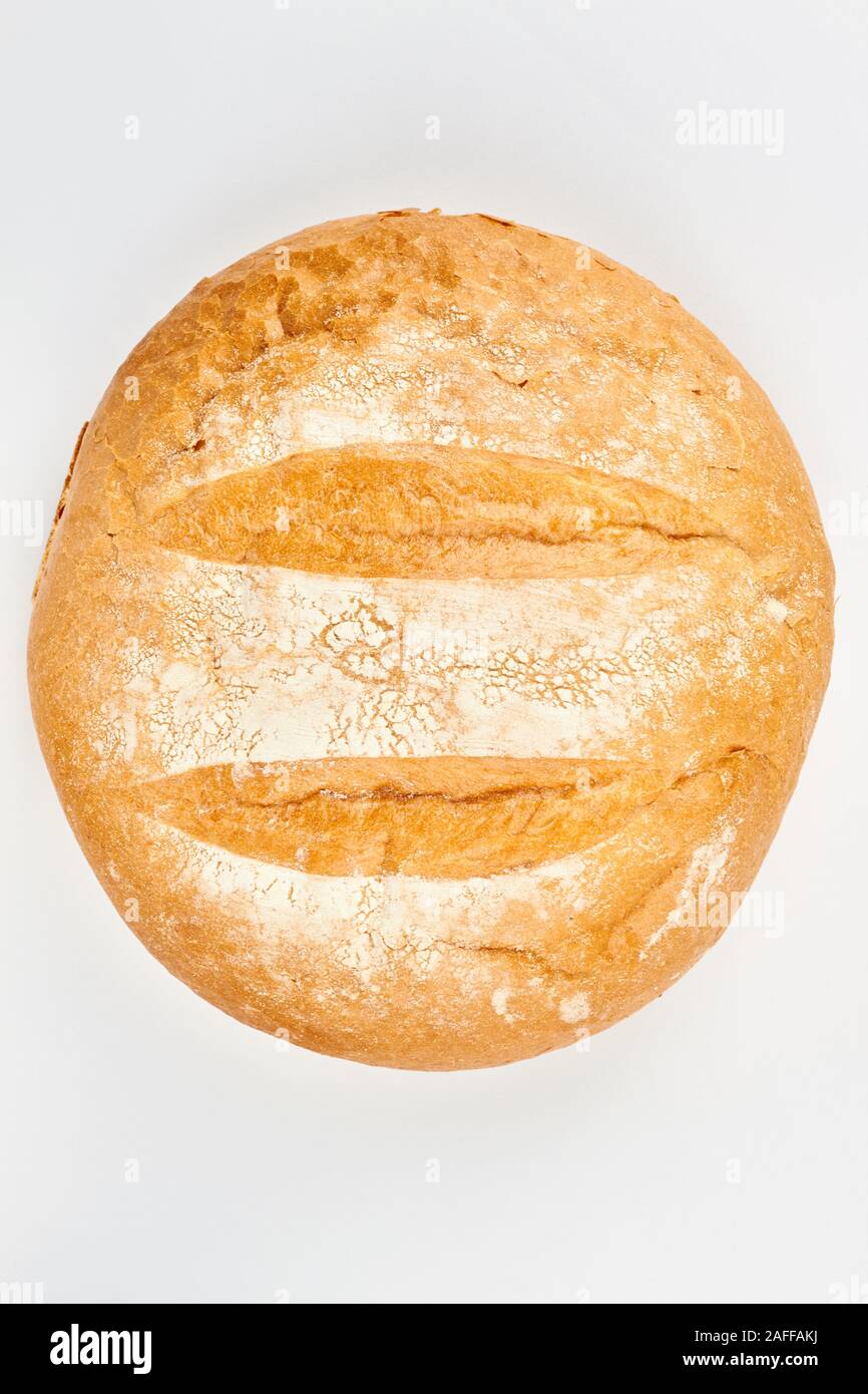 Round wheat bread on white background Stock Photo - Alamy