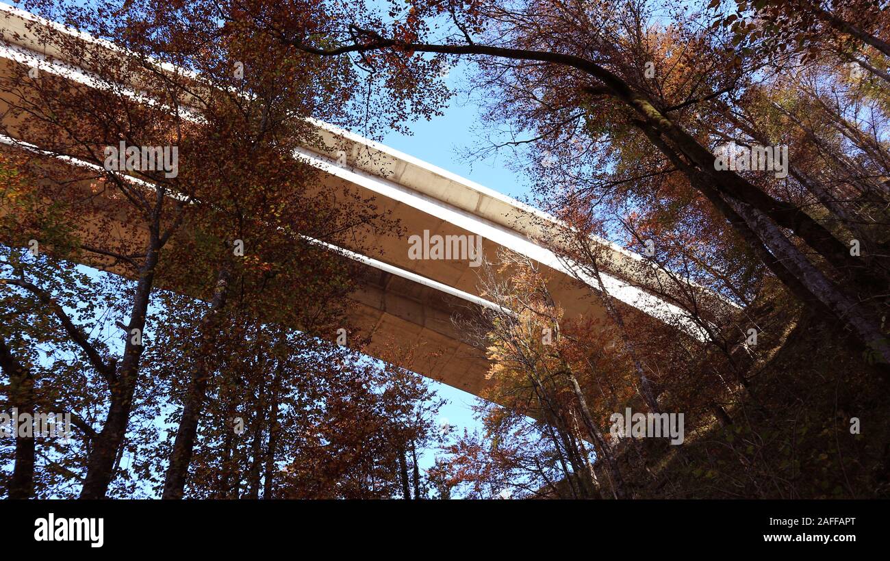Highway bridge over mountain path Stock Photo - Alamy