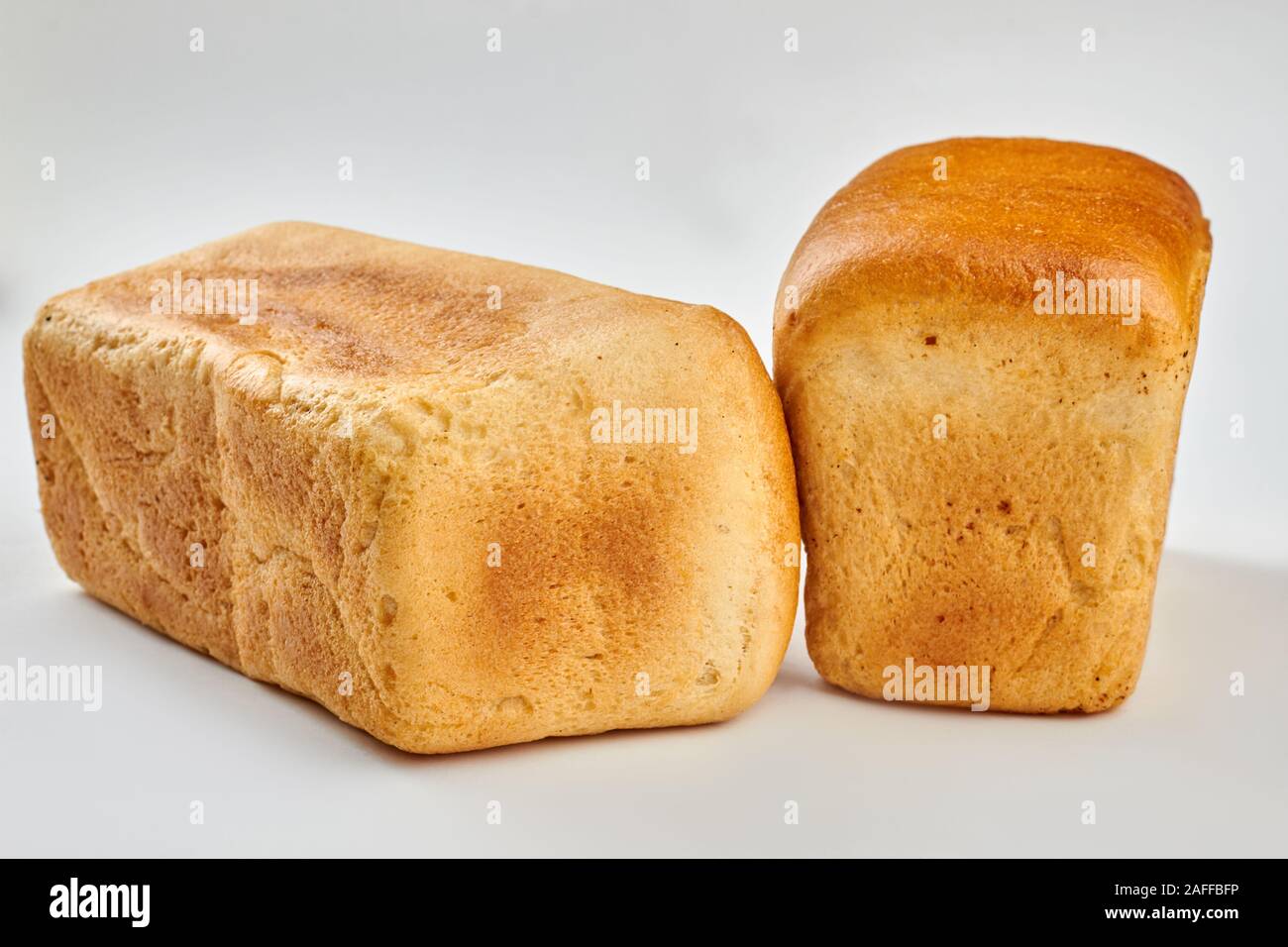 Two loaves of fresh white bread Stock Photo - Alamy