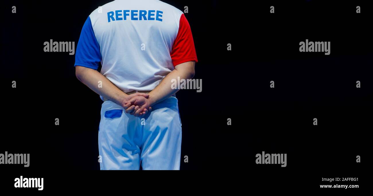 sports referee on a black background Stock Photo - Alamy