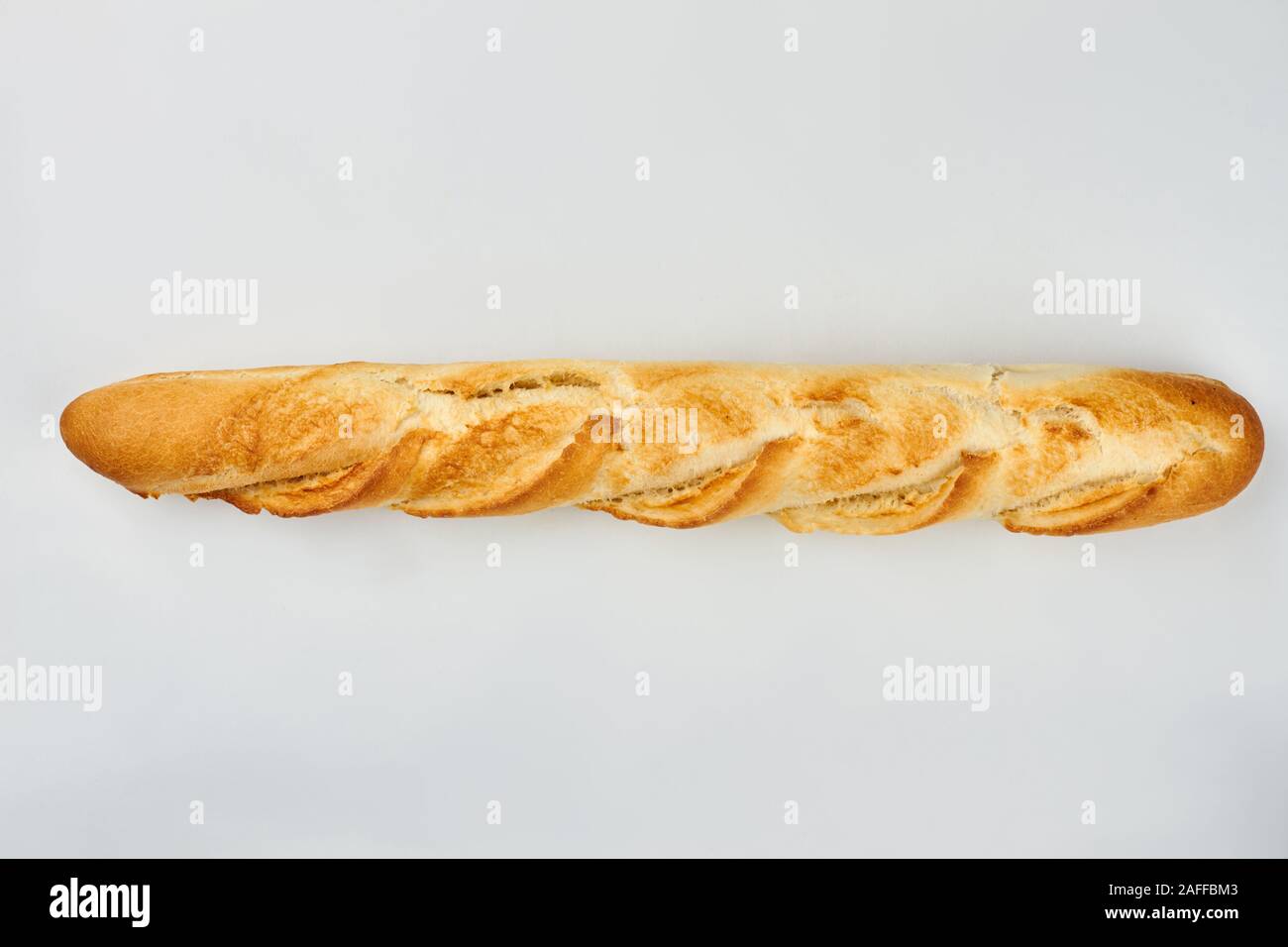 Long french baguette on white background Stock Photo - Alamy