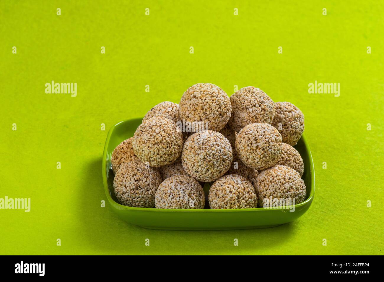 Amaranth or Rajgira laddu, Cholai ke laddo in green plate on green ...