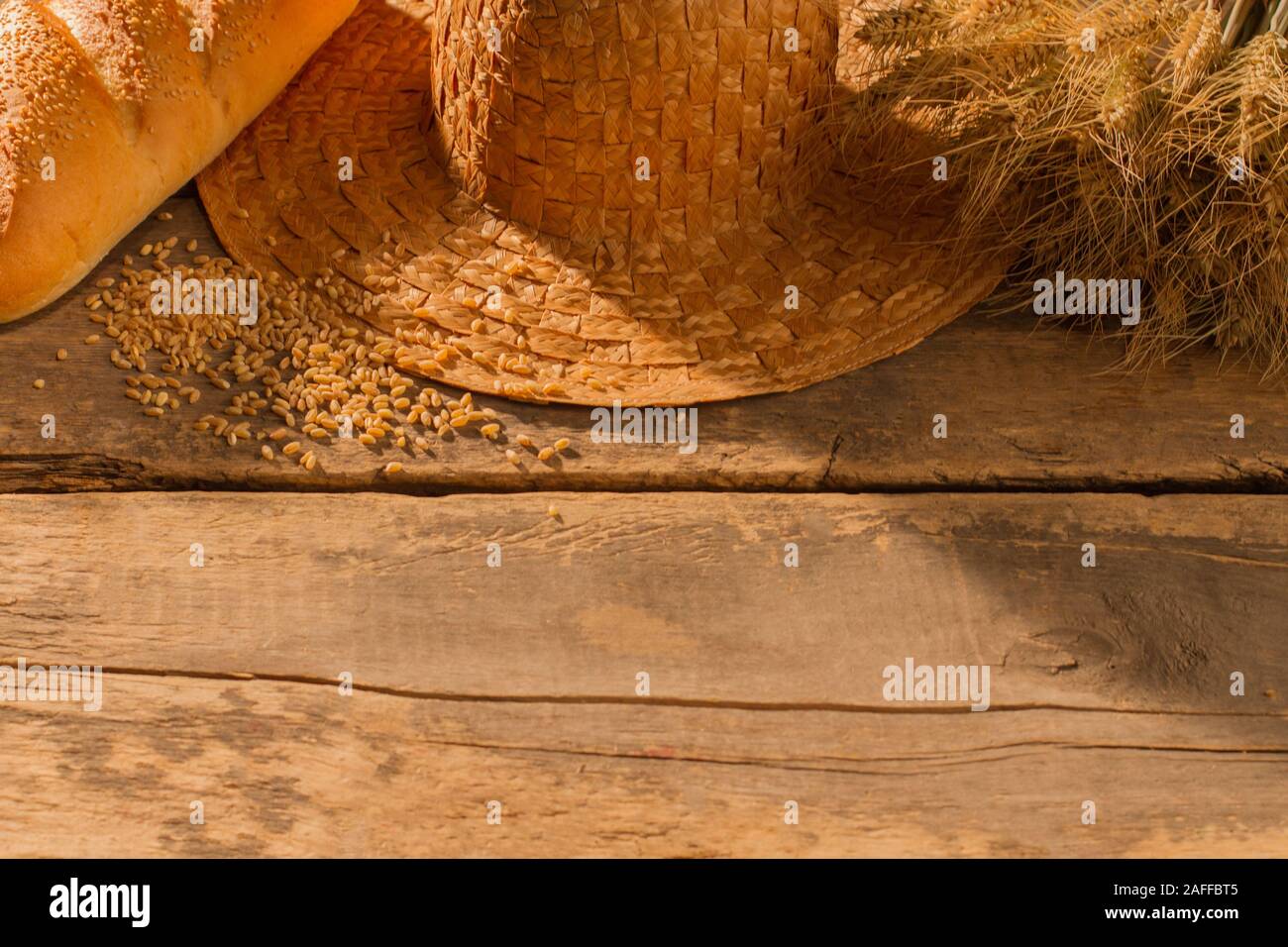 Bread, hat and wheat grain with spikelets Stock Photo - Alamy