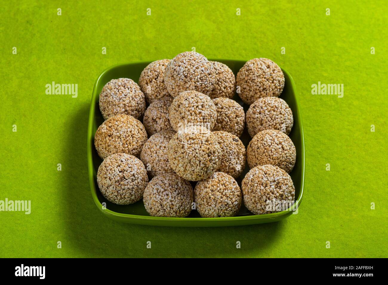 Amaranth or Rajgira laddu, Cholai ke laddo in green plate on green ...