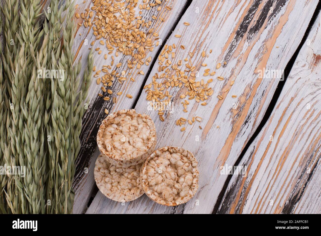 Oat ears, flakes and crunchy round crispbread Stock Photo - Alamy