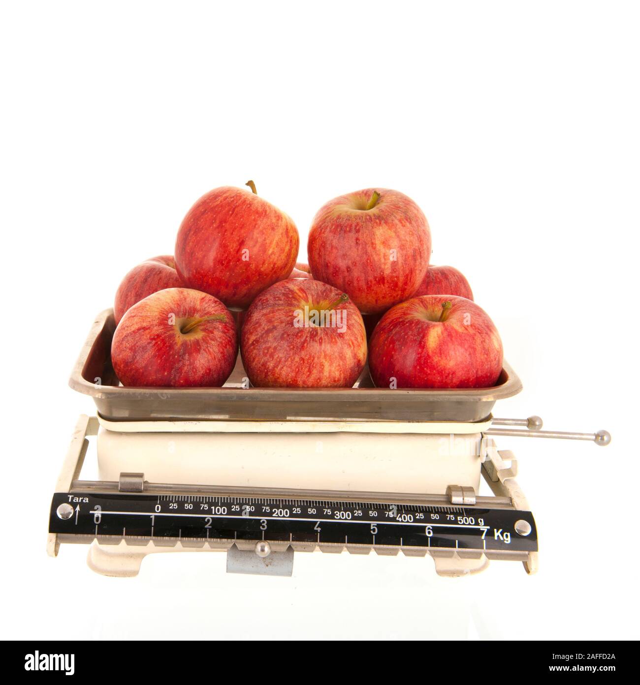 Kitchen weight scale fresh red apples isolated over white background ...