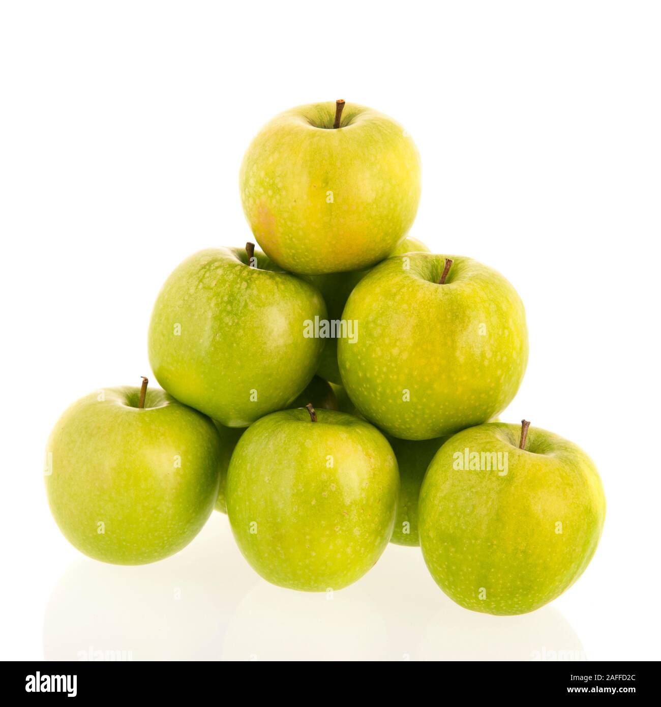 pyramid from green apples isolated over white background Stock Photo ...