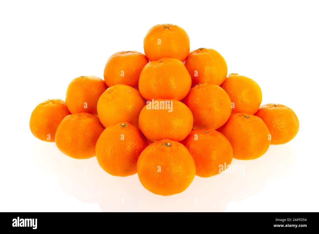 pyramid from orange mandarins isolated over white background Stock ...