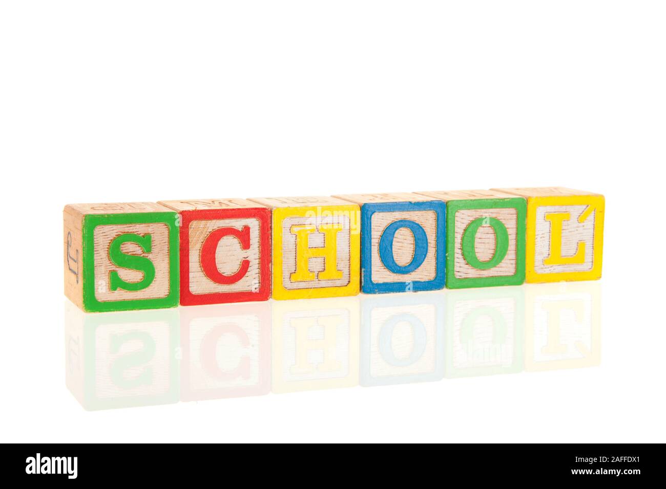 Colorful educational wooden toy blocks with letters Stock Photo - Alamy