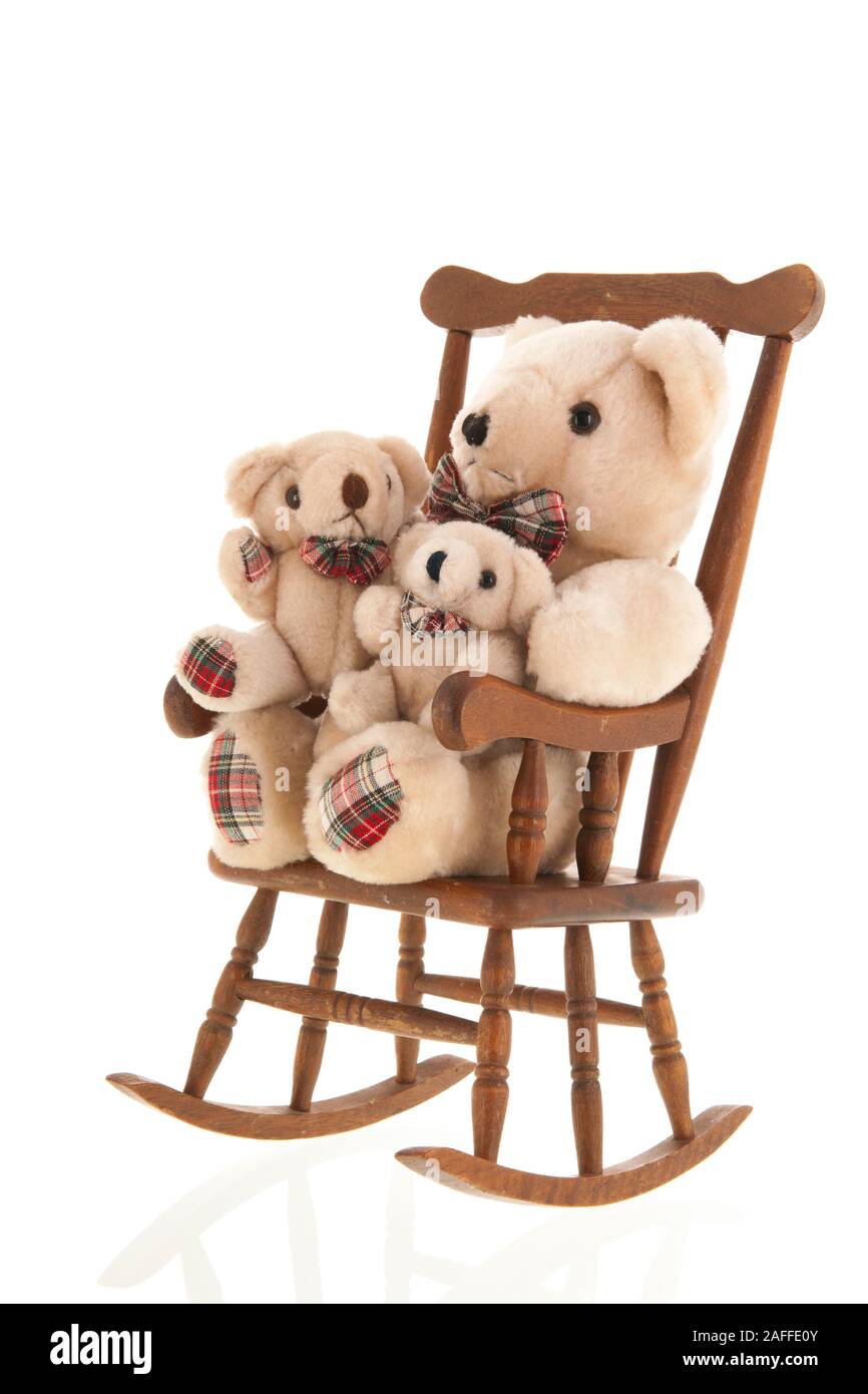 Classic rocking chair full with many stuffed bears isolated over white ...