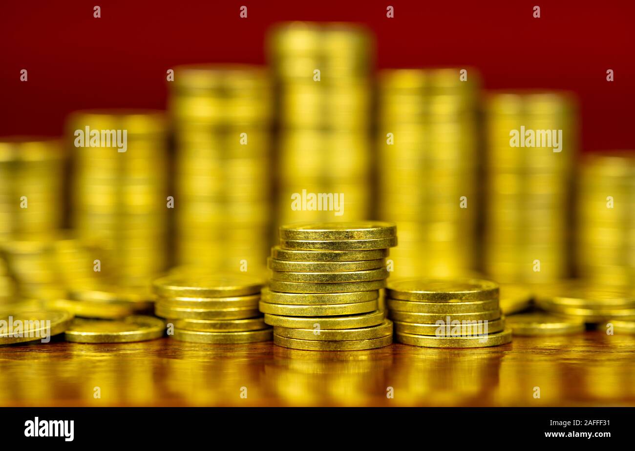 Shiny stack of golden coins. Close up photo. Business concept ...