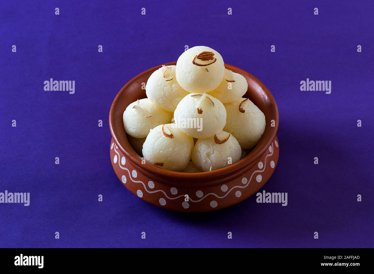 ndian Sweet or Dessert - Rasgulla in clay pot Stock Photo - Alamy