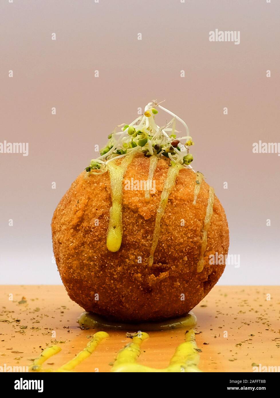 Ecuadorian bolon de verde or green plantain dumplings stuffed with ...