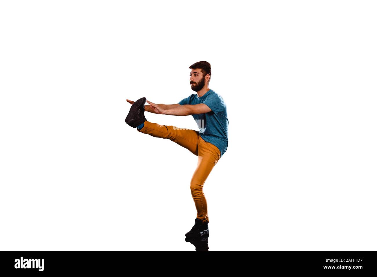 Handsome guy prepare for breakdancing on white background Stock Photo ...
