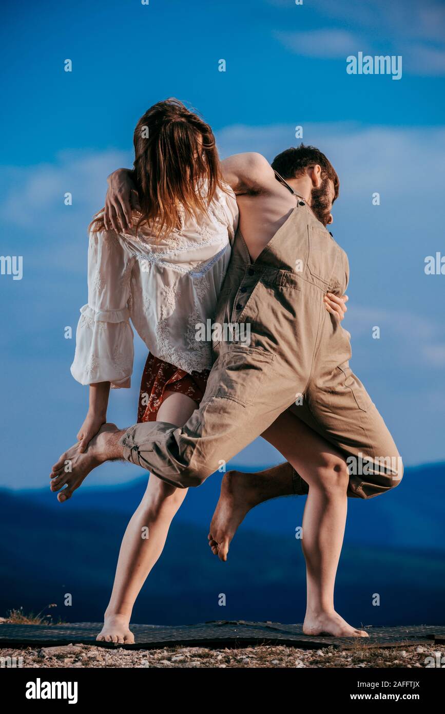 Young beautiful barefoot couple dancer practicing modern dance Stock ...