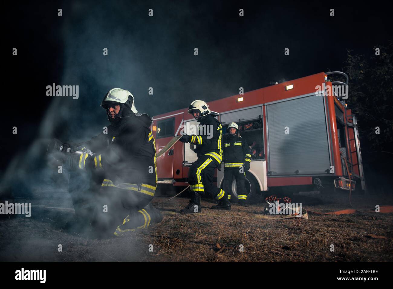 Fire station crew responding to fire emergency situation Stock Photo ...