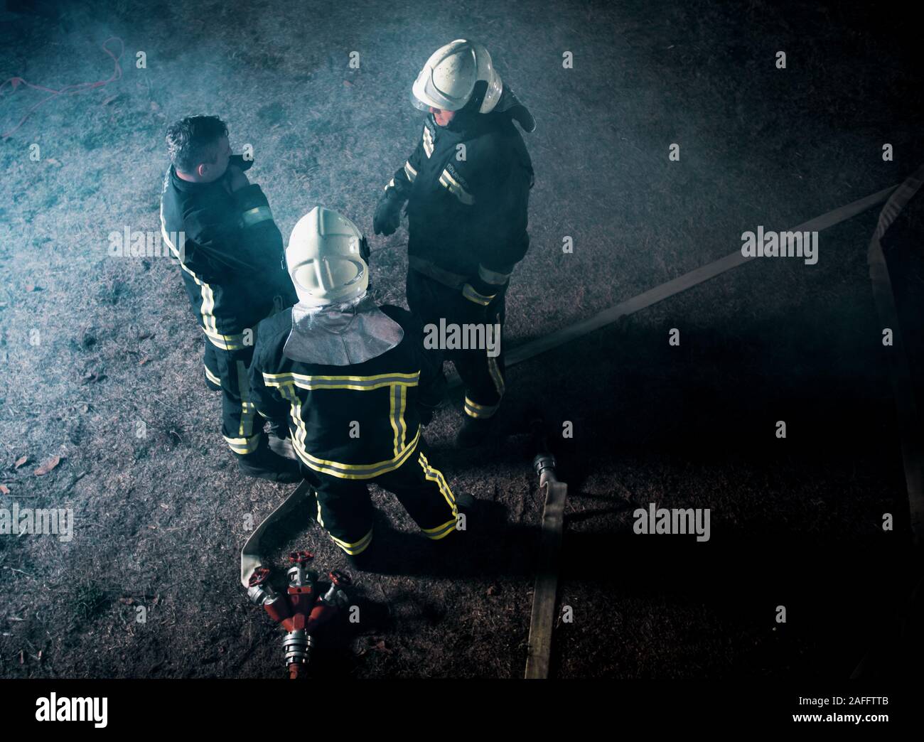 Fire department in the field during a fire emergency situation Stock ...