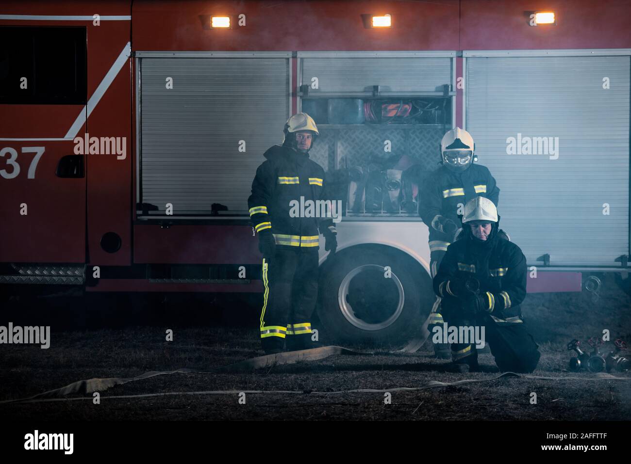 Fire department in the field during a fire emergency situation Stock ...