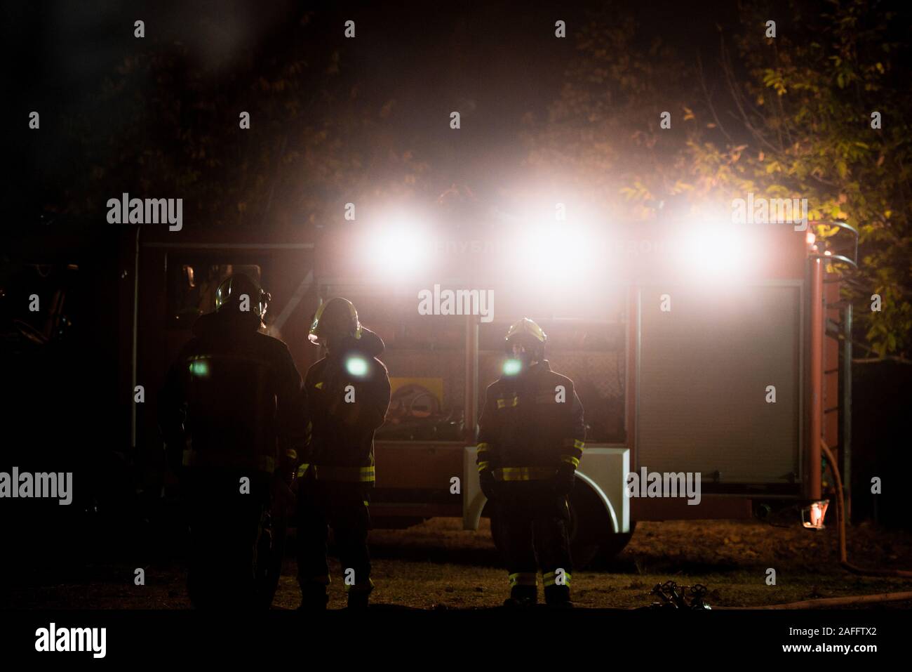 Fire station crew responding to fire emergency situation Stock Photo ...