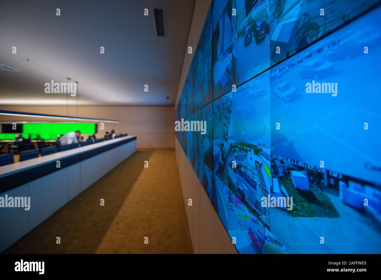 Empty office, desk, and chairs at a main CCTV security data center ...