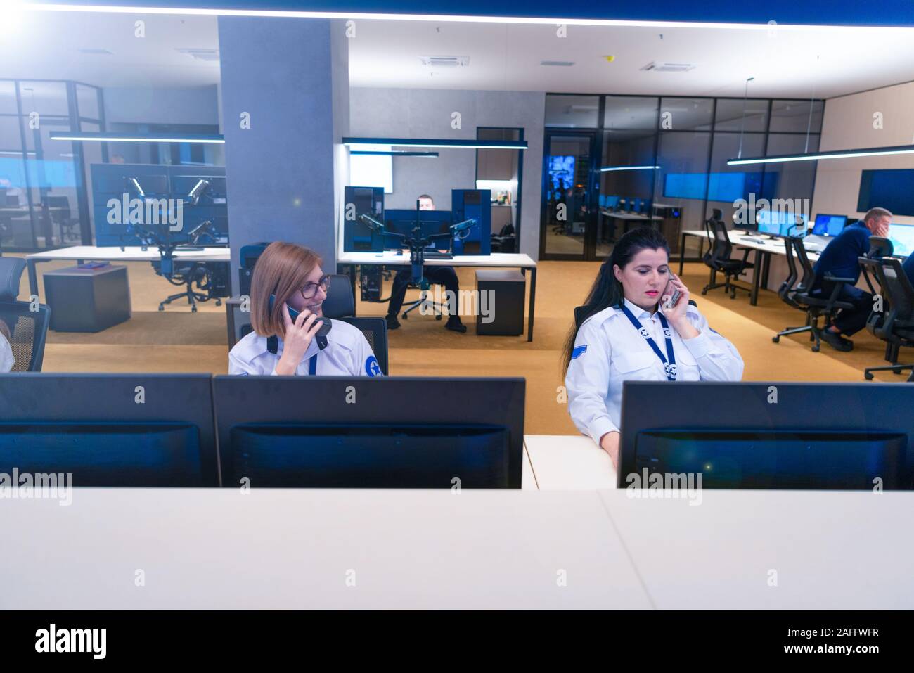 In the System Control Room, Technical Operator Works at His Workstation ...