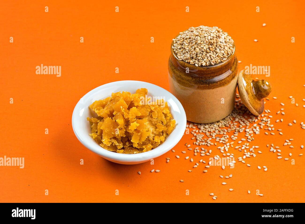 Sesame Seeds in clay pot with Jaggery in bowl Stock Photo - Alamy