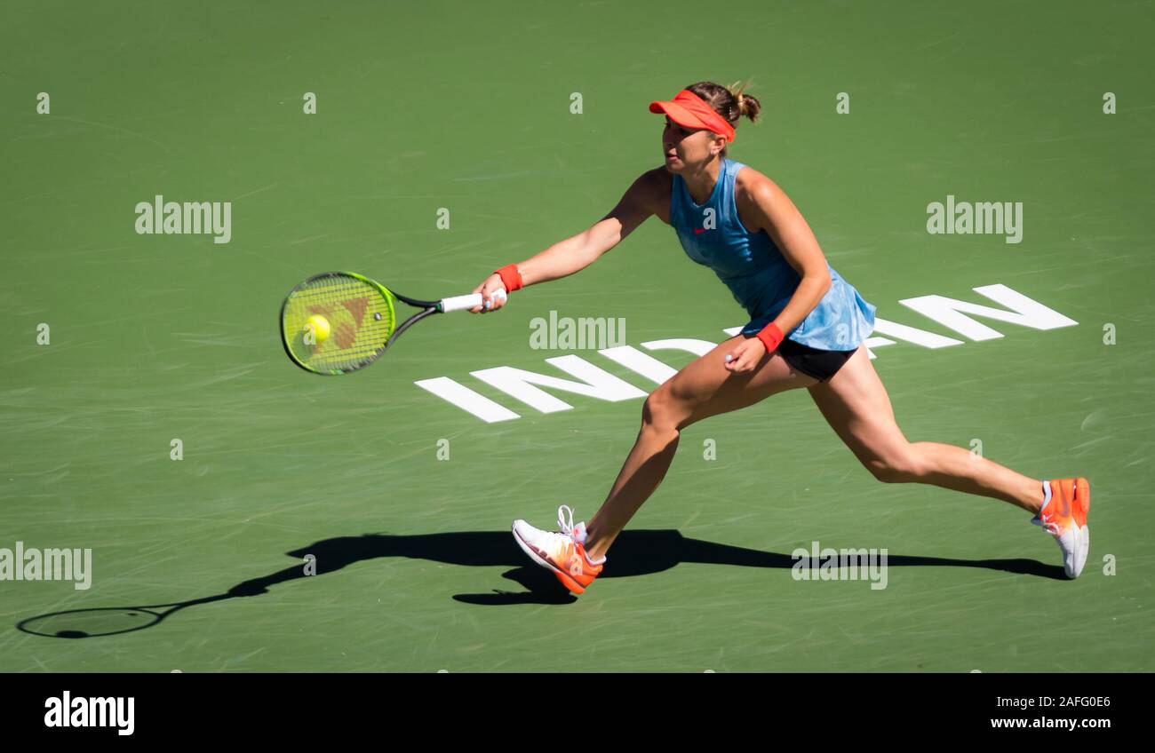 Belinda Bencic of Switzerland in action during her quarter-final match ...