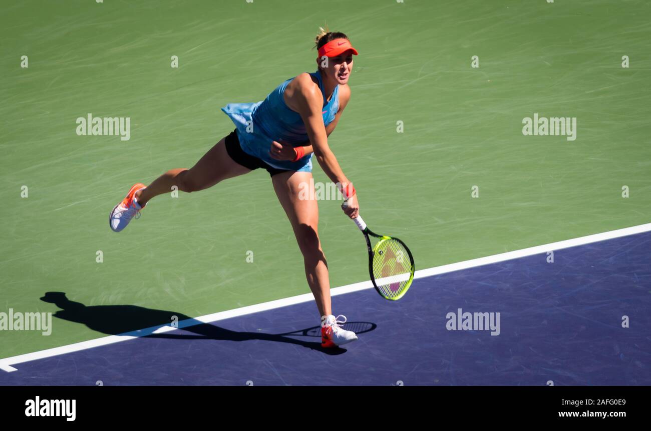 Belinda Bencic of Switzerland in action during her quarter-final match ...