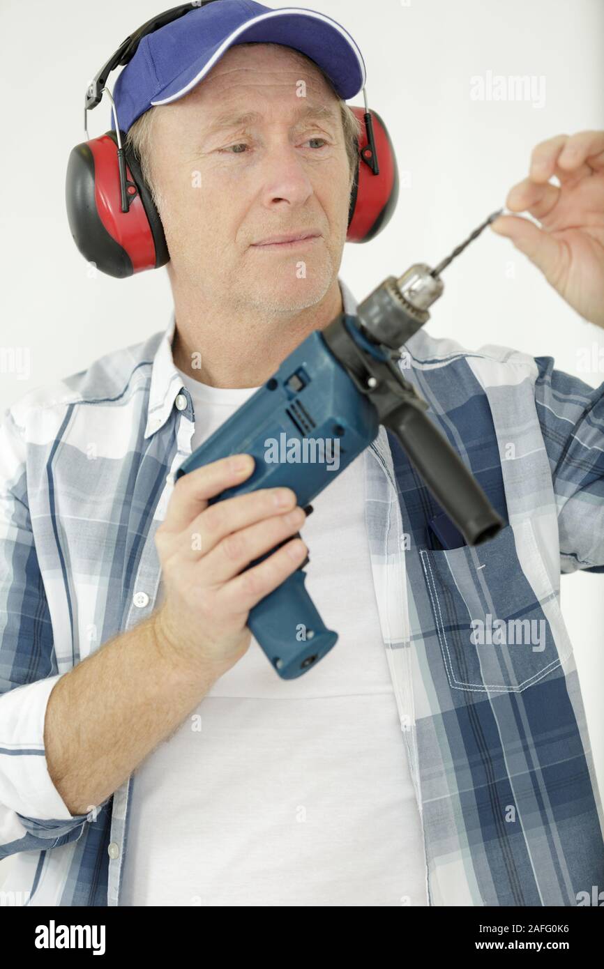 man drill at home working Stock Photo - Alamy
