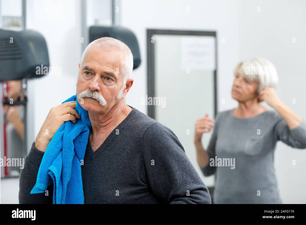 Woman getting dressed locker room hi-res stock photography and images ...