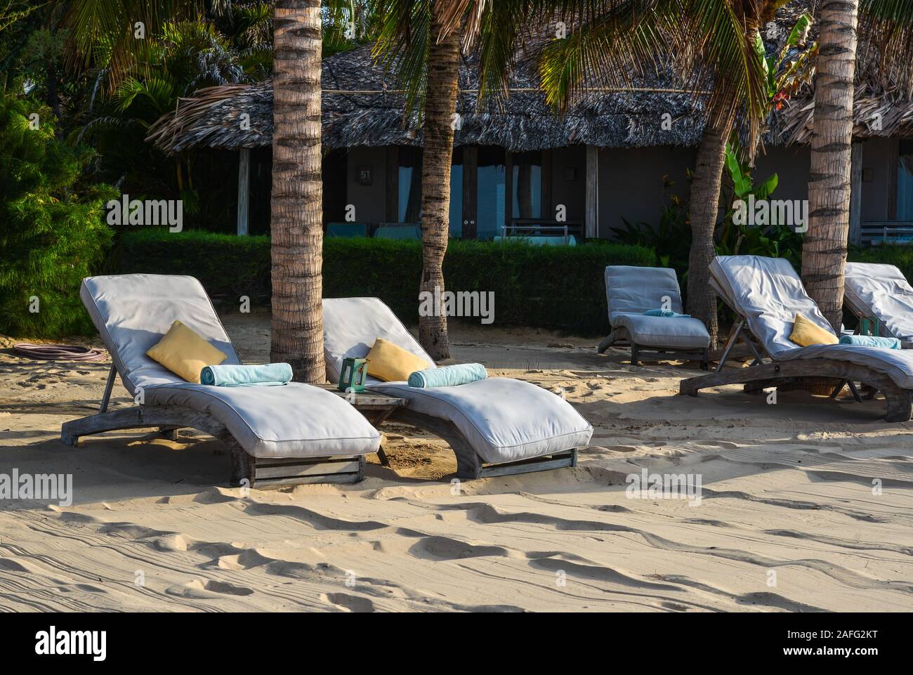 Relaxing chairs at the seaside luxury resort in Mui Ne Town, Phan Thiet ...