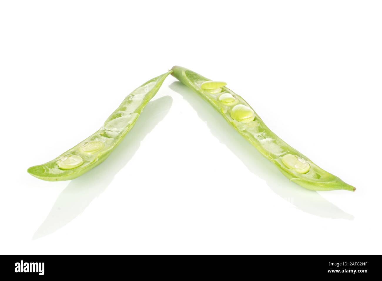 Group of two halves of snap green bean isolated on white background ...