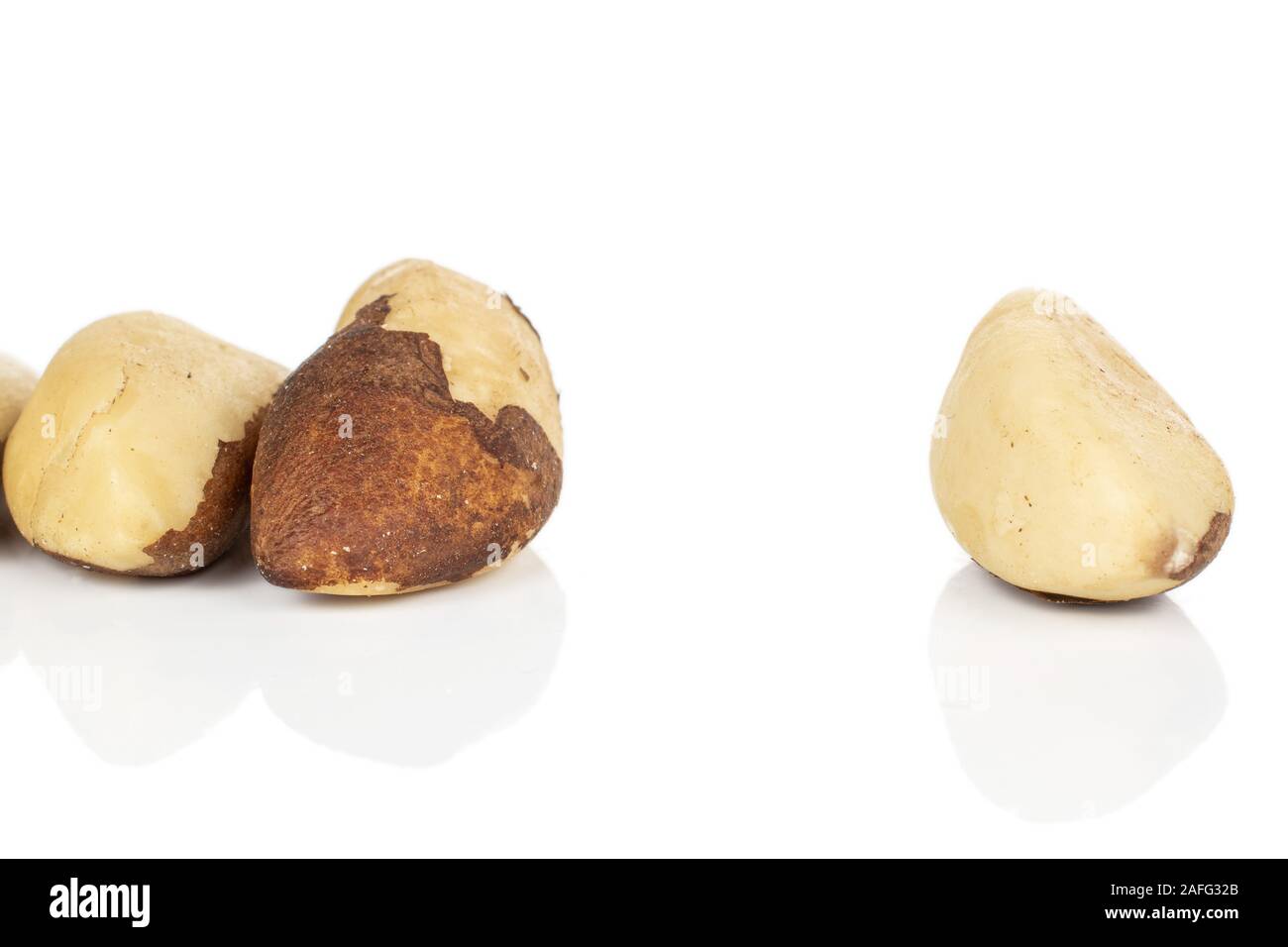 Group of three whole brazil brown nut isolated on white background ...
