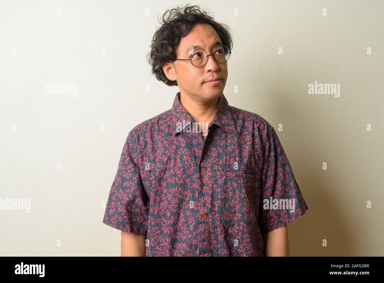 Japanese man eyeglasses thinking hi-res stock photography and images ...