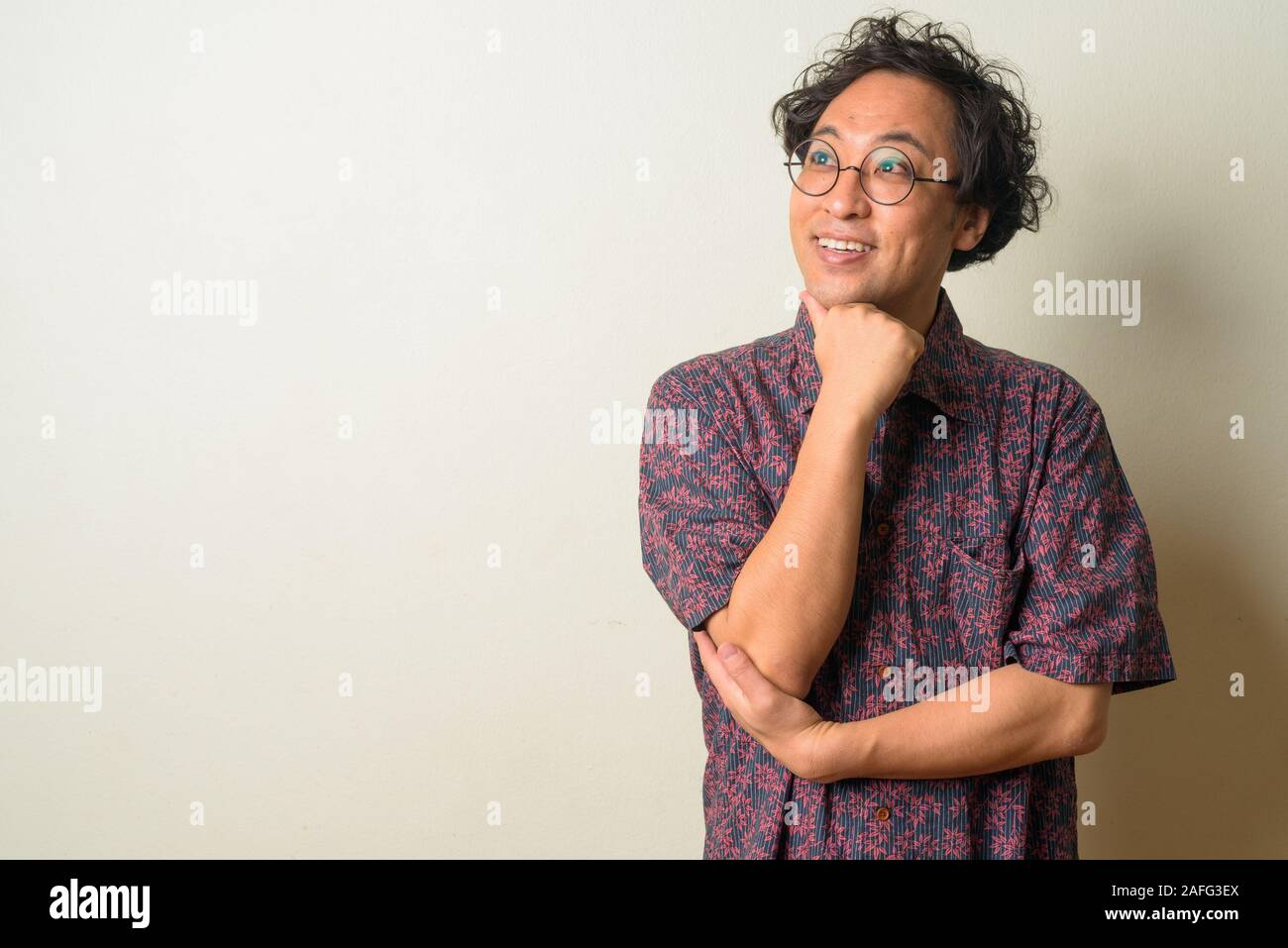 Japanese man eyeglasses thinking hi-res stock photography and images ...