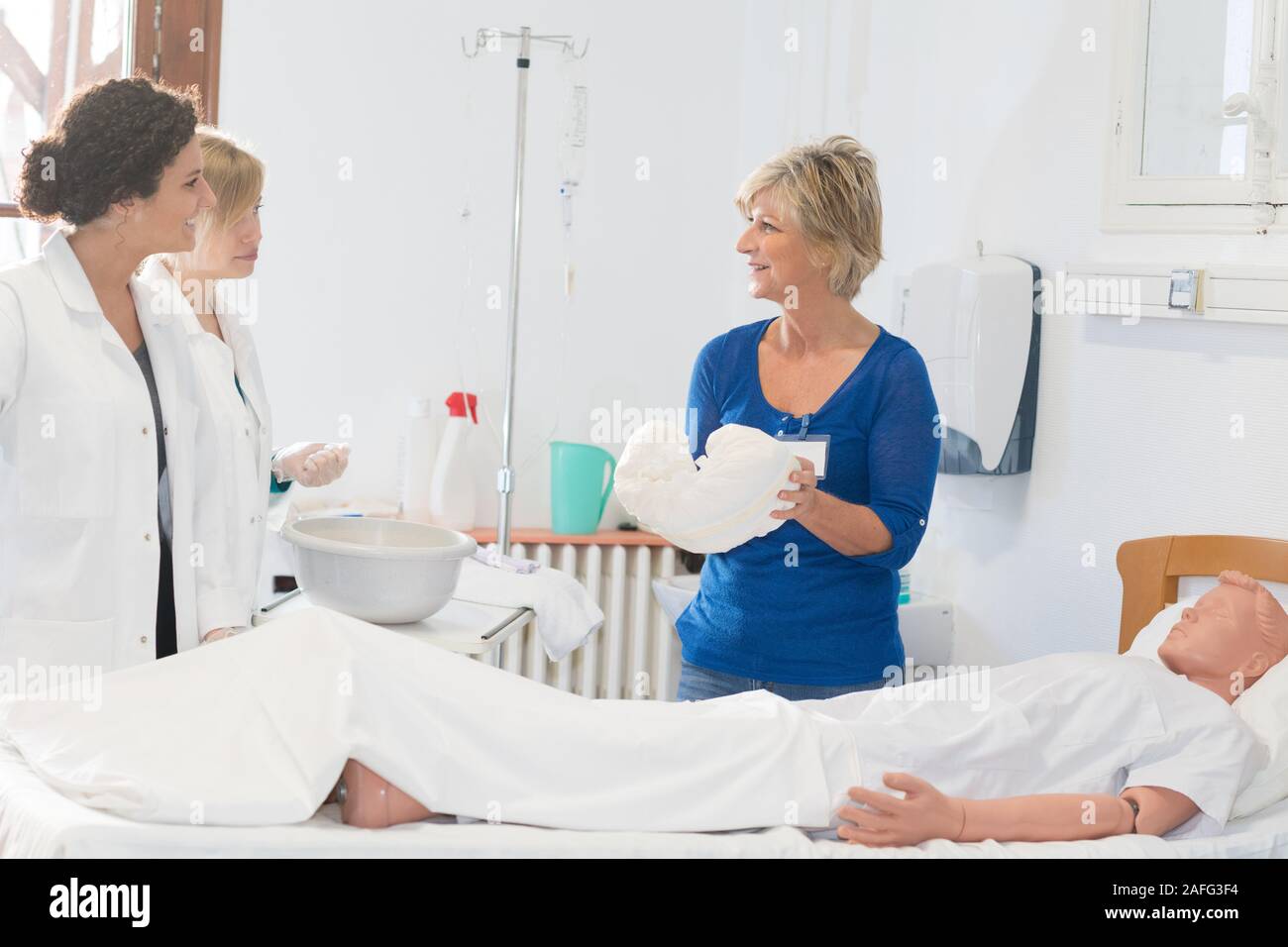 medical staffs learning how to change diapers Stock Photo - Alamy