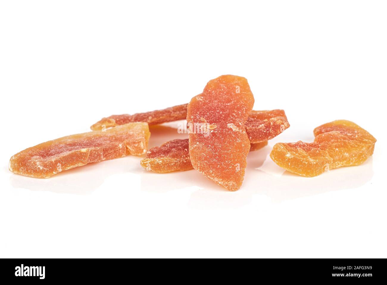Group of five whole dried orange papaya piece isolated on white ...