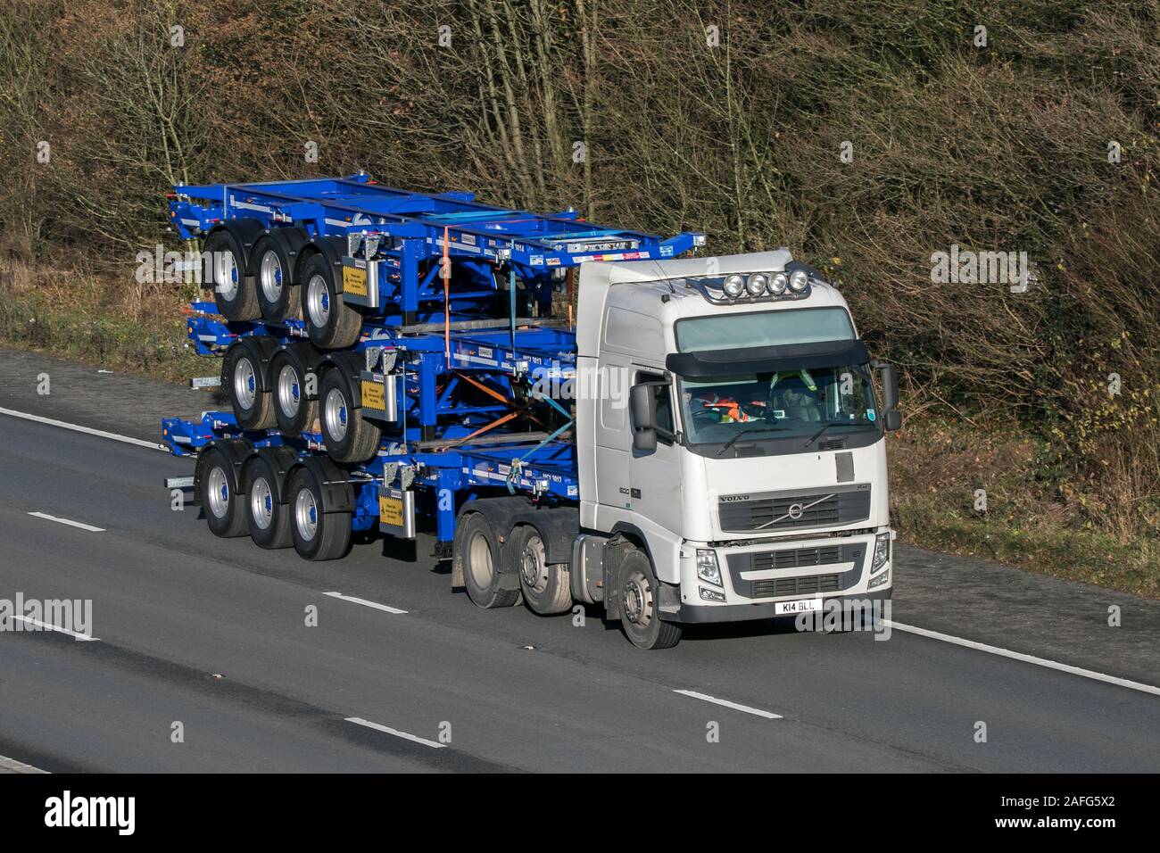 Maritime transport trailers volvo globetrotter driving on the M61 ...
