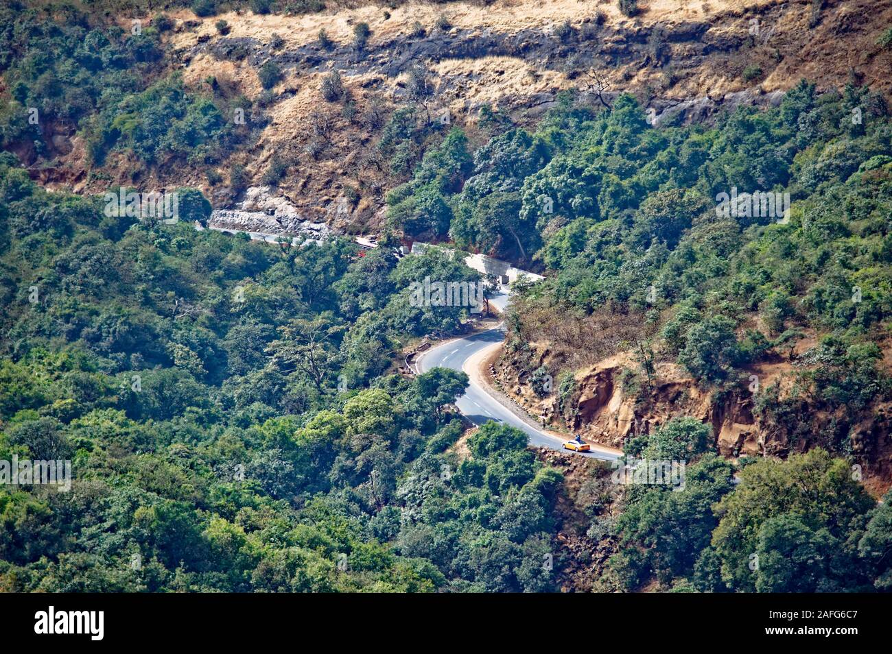 Road in a valley Stock Photo - Alamy