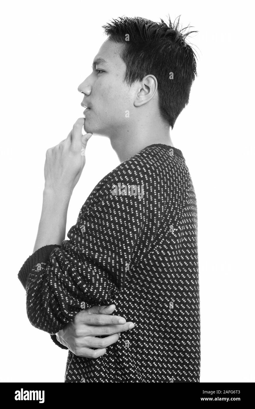 Young thoughtful man thinking Black and White Stock Photos & Images - Alamy