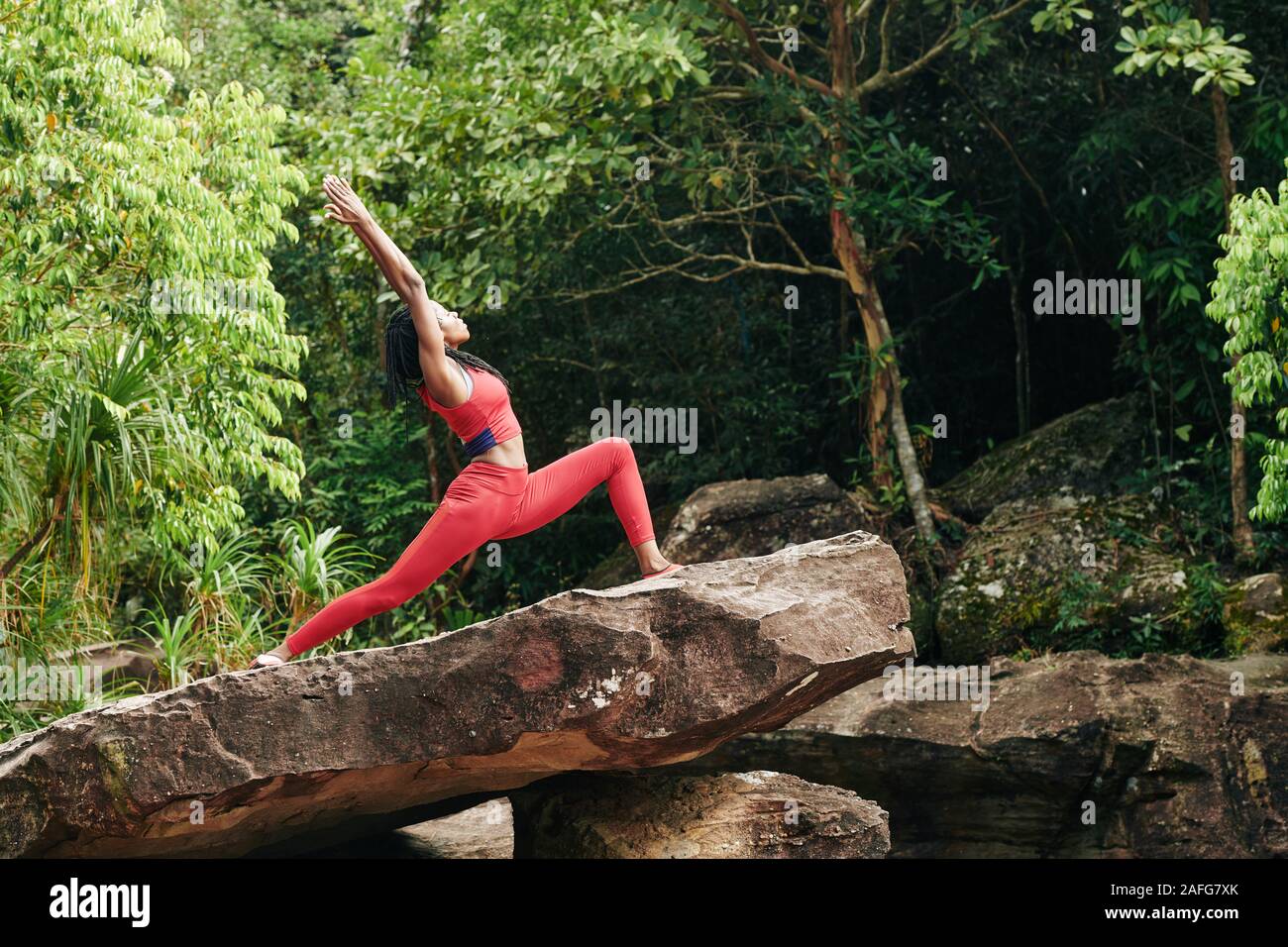 Warrior pose on rock hi-res stock photography and images - Alamy
