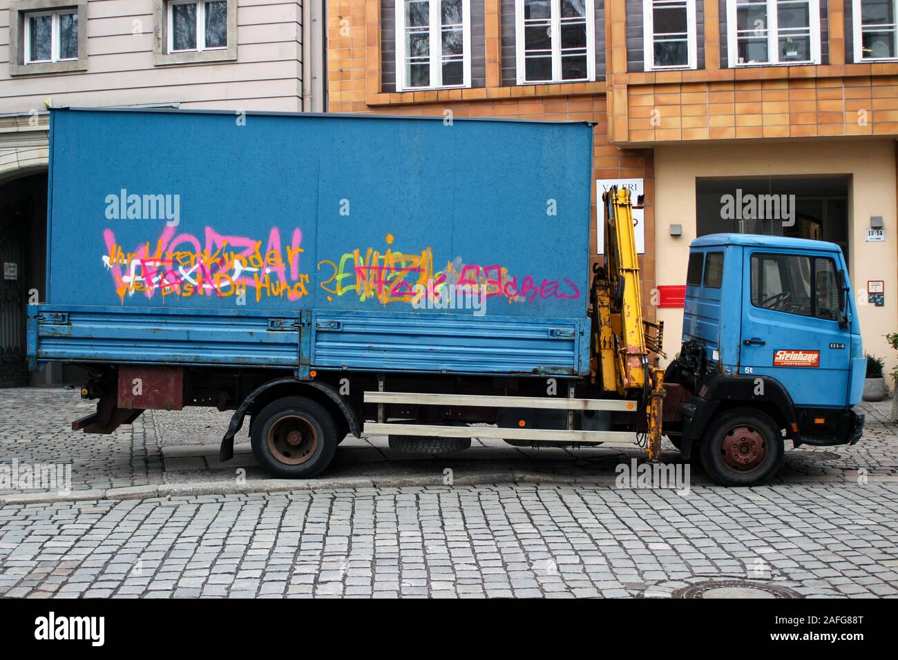 Blue lorry with colorful graffitis in Berlin, Germany Stock Photo - Alamy