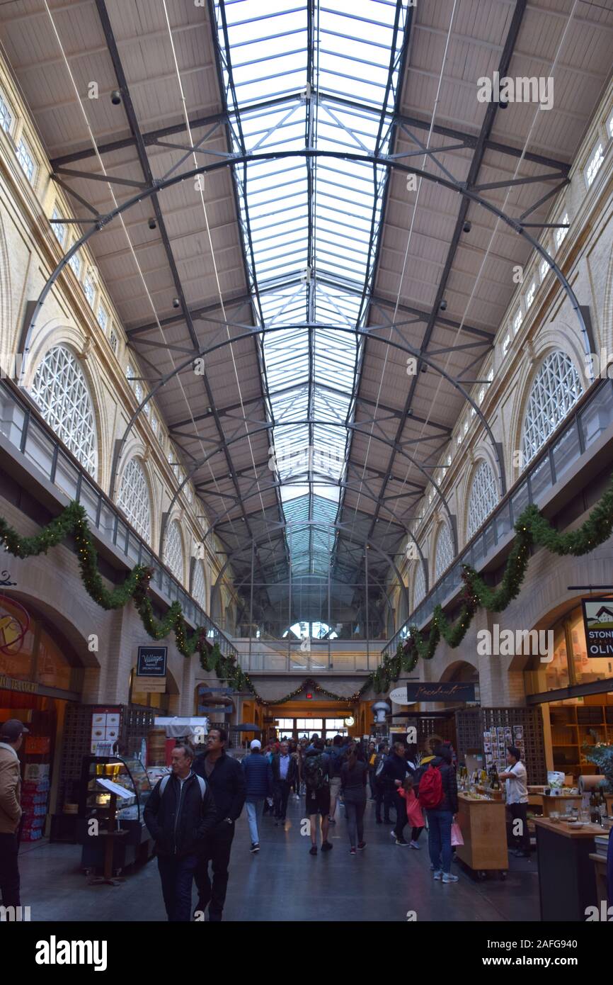 Interior of the Ferry Building, San Francisco. Small retail businesses ...