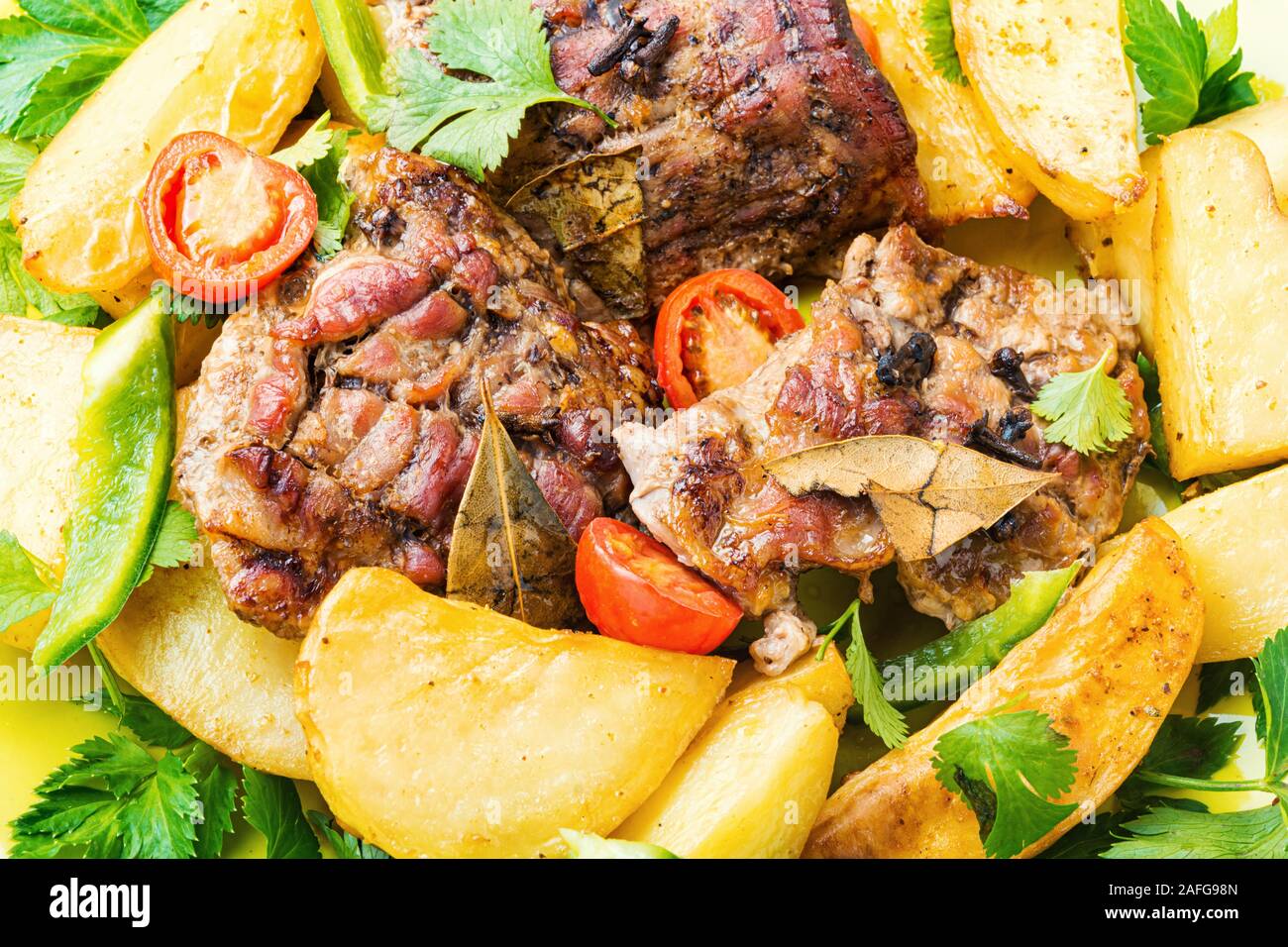 Danish meat baked with new potatoes.Roasted meat Stock Photo - Alamy